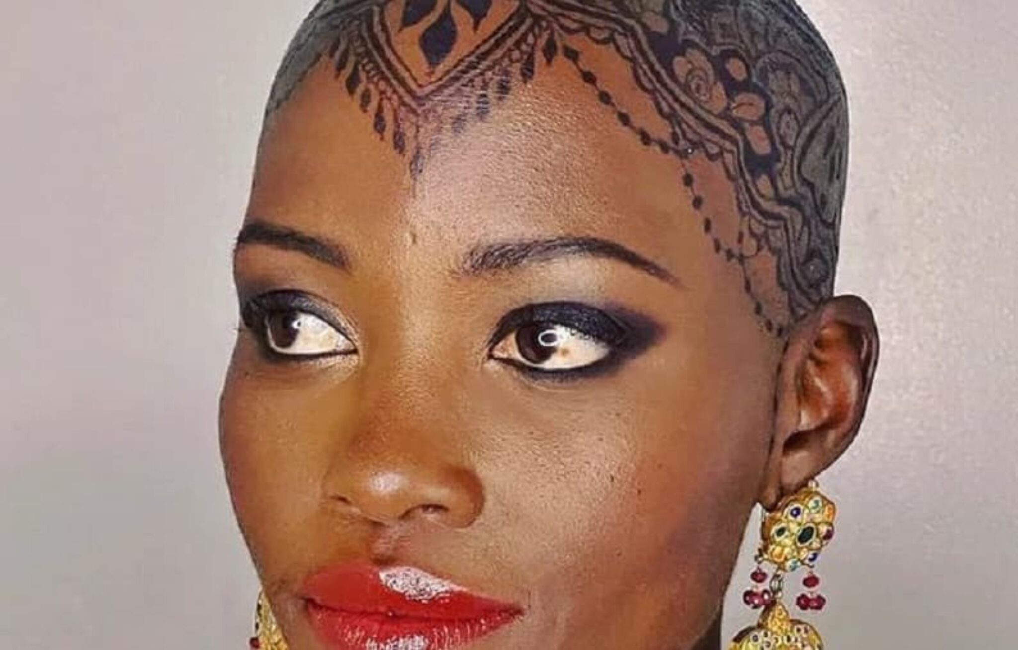 Lupita Nyong'o Gives An Interesting Story About Her Henna Design Bald ...