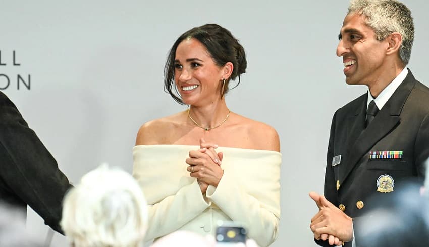 Meghan Markle Oozes Glamour in a White Off-The-Shoulder Pantsuit | FPN