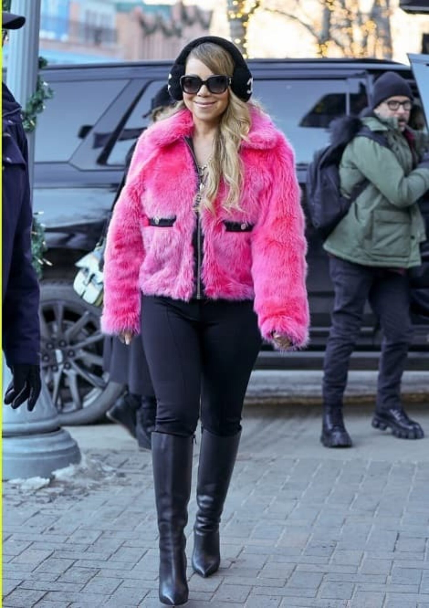 Mariah Carey Looks Pretty in a Pink Fur Jacket and Black Leggings | FPN