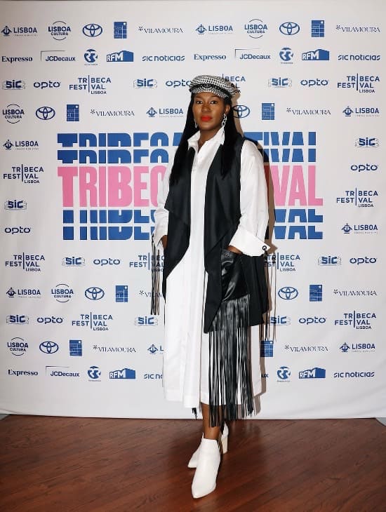 Stephanie Okereke Nails Parisian Chic in a Shirt Dress, Jacket, and a ...